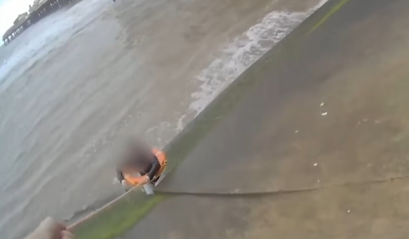 Hero police officer saves woman from being swept into sea at Blackpool ...